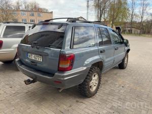 Zils Jeep Grand Cherokee 2003 Rēzekne, ar dzinēja tilpumu 2.70 L un nobraukumu 347 tūkst. km par 5600 €, foto 4 vietnē AUTOMOTO.COM.LV