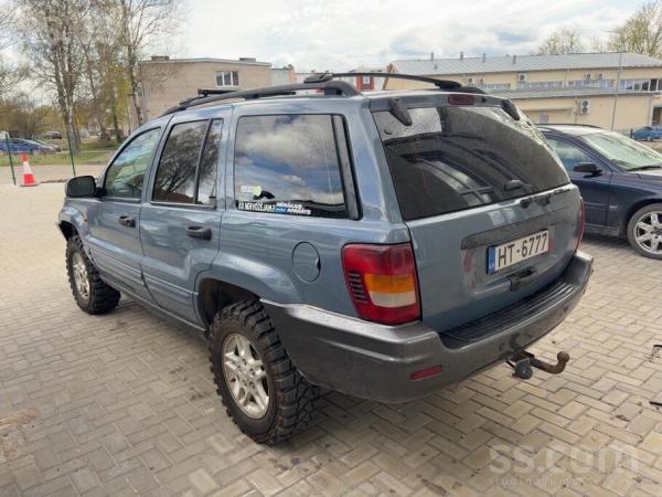 Zils Jeep Grand Cherokee 2003 Rēzekne, ar dzinēja tilpumu 2.70 L un nobraukumu 347 tūkst. km par 5600 €, foto 4 vietnē AUTOMOTO.COM.LV