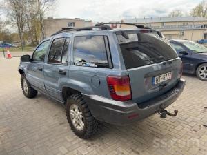 Zils Jeep Grand Cherokee 2003 Rēzekne, ar dzinēja tilpumu 2.70 L un nobraukumu 347 tūkst. km par 5600 €, foto 5 vietnē AUTOMOTO.COM.LV