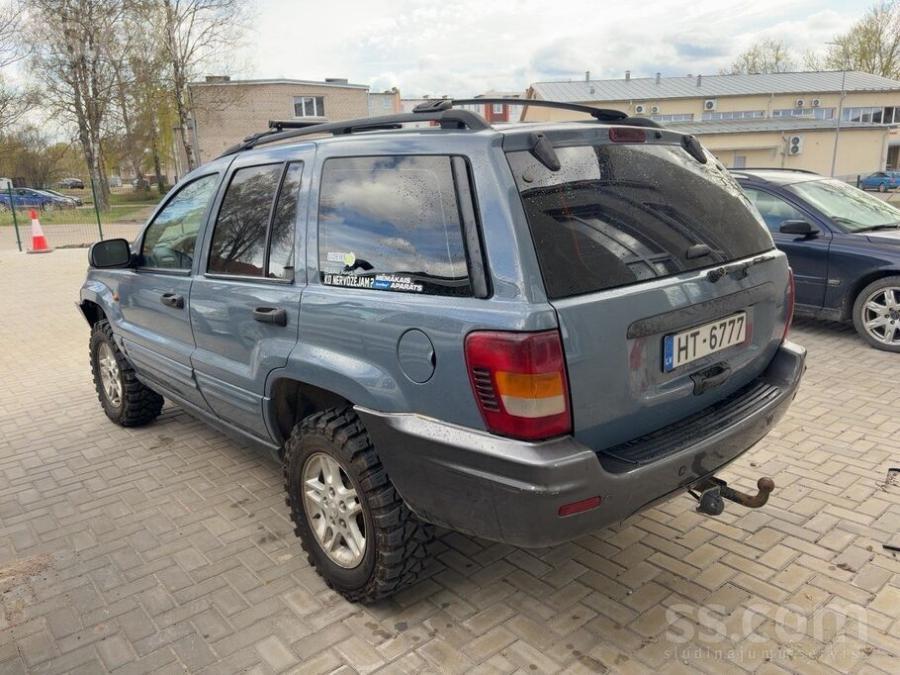 Zils Jeep Grand Cherokee 2003 Rēzekne, ar dzinēja tilpumu 2.70 L un nobraukumu 347 tūkst. km par 5600 €, foto 5 vietnē AUTOMOTO.COM.LV