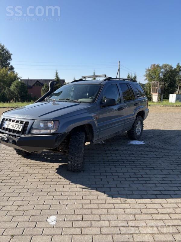 Zils Jeep Grand Cherokee 2003 Rēzekne, ar dzinēja tilpumu 2.70 L un nobraukumu 347 tūkst. km par 4299 €, foto 4 vietnē AUTOMOTO.COM.LV