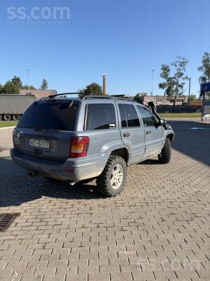 Zils Jeep Grand Cherokee 2003 Rēzekne, ar dzinēja tilpumu 2.70 L un nobraukumu 347 tūkst. km par 4299 €, foto 5 vietnē AUTOMOTO.COM.LV