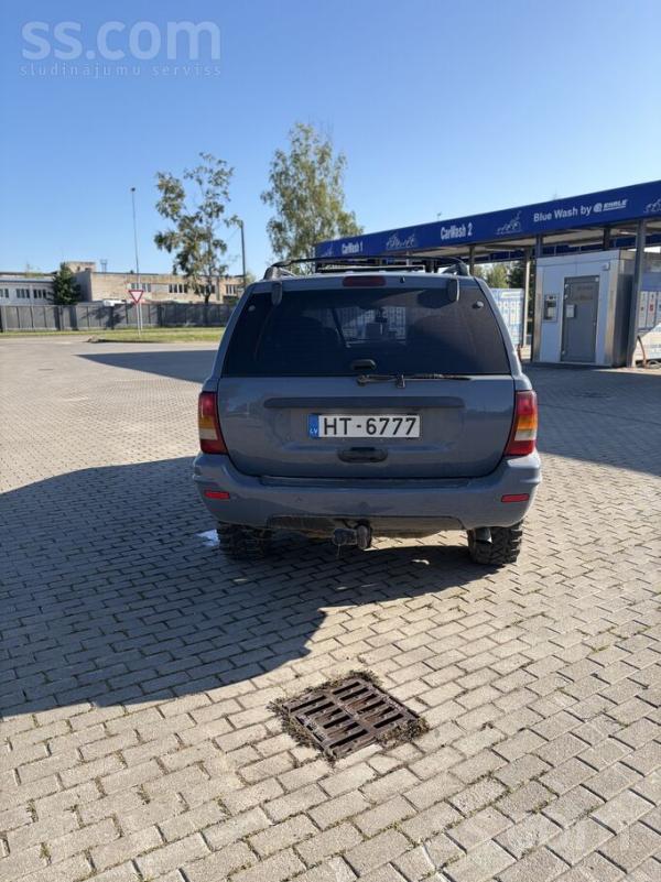 Zils Jeep Grand Cherokee 2003 Rēzekne, ar dzinēja tilpumu 2.70 L un nobraukumu 347 tūkst. km par 4299 €, foto 6 vietnē AUTOMOTO.COM.LV