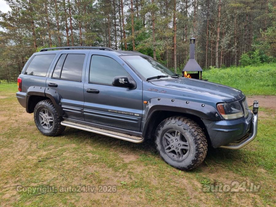 Zils Jeep Grand Cherokee 2003 Tallina, ar dzinēja tilpumu 2.70 L un nobraukumu 427 tūkst. km par 5000 €, foto 9 vietnē AUTOMOTO.COM.LV