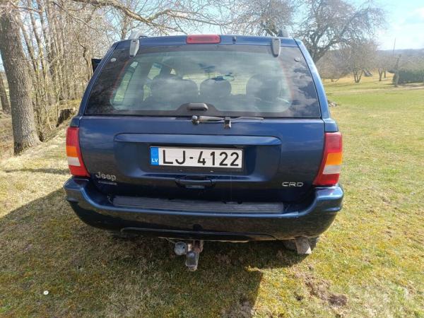 Blue Jeep Grand Cherokee 2004 in Saldus, with an engine capacity of 2.70 L and mileage of 260 thousand km for 4500 €, photo 3 on AUTOMOTO.COM.LV