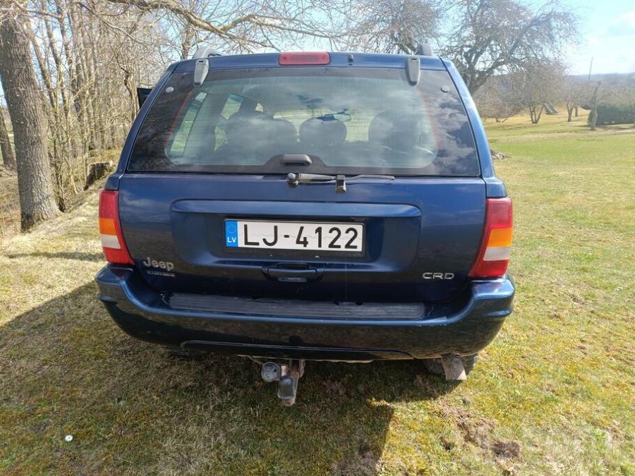 Blue Jeep Grand Cherokee 2004 in Saldus, with an engine capacity of 2.70 L and mileage of 260 thousand km for 4500 €, photo 4 on AUTOMOTO.COM.LV