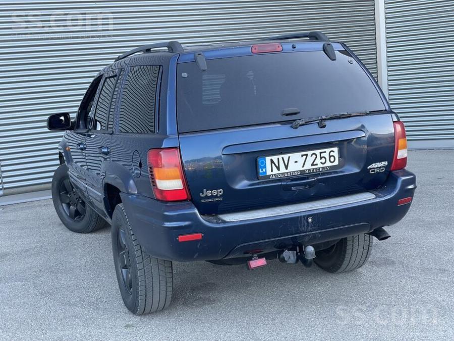 Zils Jeep Grand Cherokee 2004 Rīga, ar dzinēja tilpumu 2.70 L un nobraukumu 323 tūkst. km par 3650 €, foto 5 vietnē AUTOMOTO.COM.LV