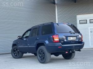 Zils Jeep Grand Cherokee 2004 Rīga, ar dzinēja tilpumu 2.70 L un nobraukumu 323 tūkst. km par 3650 €, foto 7 vietnē AUTOMOTO.COM.LV