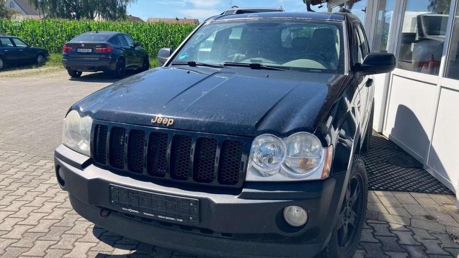 Zils Jeep Grand Cherokee 2005 Utena, ar dzinēja tilpumu 4.70 L un nobraukumu 204 tūkst. km par 2650 €, foto 9 vietnē AUTOMOTO.COM.LV
