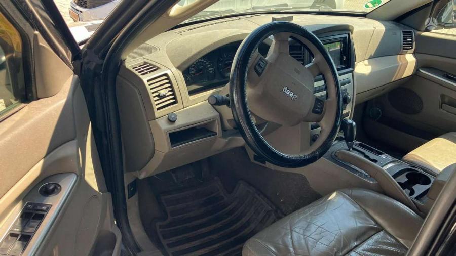 Zils Jeep Grand Cherokee 2005 Utena, ar dzinēja tilpumu 4.70 L un nobraukumu 204 tūkst. km par 2650 €, foto 11 vietnē AUTOMOTO.COM.LV