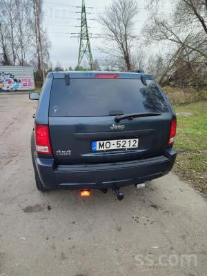 Blue Jeep Grand Cherokee 2007 in Riga, with an engine capacity of 3.70 L and mileage of 335 thousand km for 3550 €, photo 7 on AUTOMOTO.COM.LV