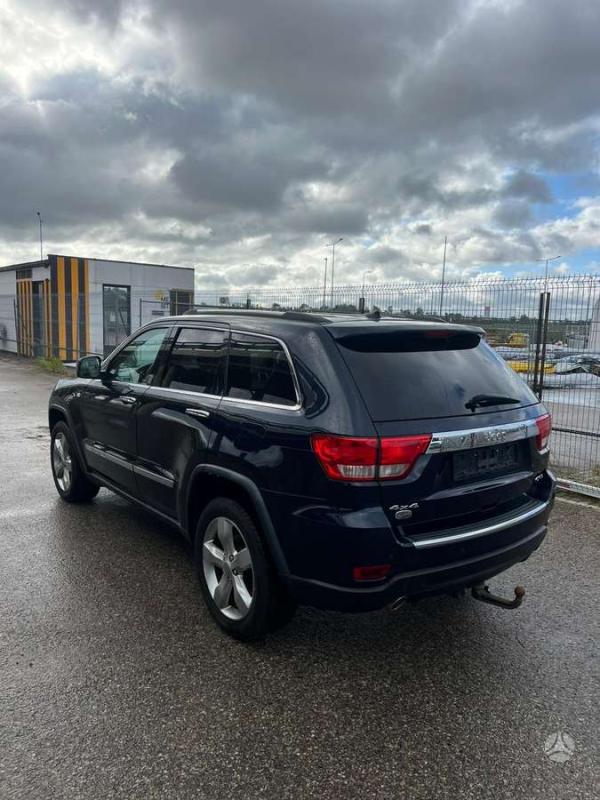 Jeep Grand Cherokee 2012 Marijampole vietnē Zils Jeep Grand Cherokee 2012 Marijampole, ar dzinēja tilpumu 3.00 L un nobraukumu 112 tūkst. km par 8500 €, foto 6 vietnē AUTOMOTO.COM.LV