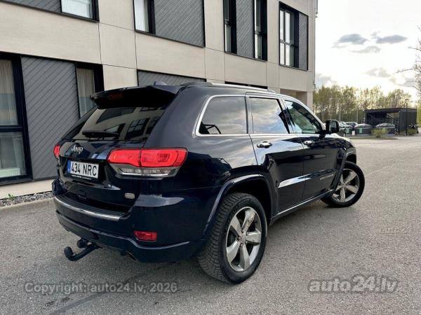 Blue Jeep Grand Cherokee 2013 in Tartu, with an engine capacity of 3.00 L and mileage of 270 thousand km for 11990 €, photo 4 on AUTOMOTO.COM.LV