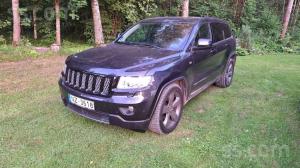 Zils Jeep Grand Cherokee 2013 Rīga, ar dzinēja tilpumu 3.00 L un nobraukumu 172 tūkst. km par 7000 €, foto  vietnē AUTOMOTO.COM.LV