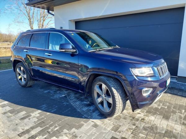 Zils Jeep Grand Cherokee 2014 Jelgava, ar dzinēja tilpumu 3.00 L un nobraukumu 143 tūkst. km par 12000 €, foto 1 vietnē AUTOMOTO.COM.LV