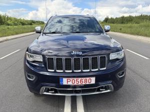 Zils Jeep Grand Cherokee 2014 Viļņa, ar dzinēja tilpumu 5.70 L un nobraukumu 285 tūkst. km par 13300 €, foto  vietnē AUTOMOTO.COM.LV