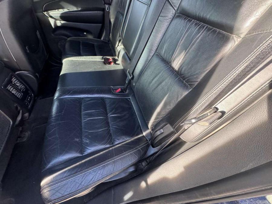Blue Jeep Grand Cherokee 2014 in Siauliai, with an engine capacity of 2.99 L and mileage of 238 thousand km for 8700 €, photo 12 on AUTOMOTO.COM.LV