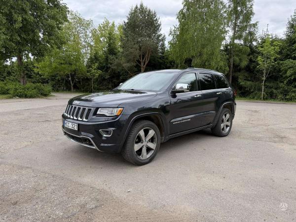 Zils Jeep Grand Cherokee 2014 Viļņa, ar dzinēja tilpumu 3.60 L un nobraukumu 172 tūkst. km par 14500 €, foto 1 vietnē AUTOMOTO.COM.LV