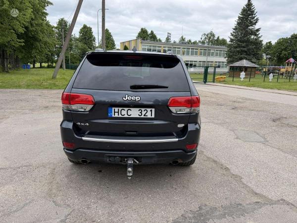 Zils Jeep Grand Cherokee 2014 Viļņa, ar dzinēja tilpumu 3.60 L un nobraukumu 172 tūkst. km par 14500 €, foto 10 vietnē AUTOMOTO.COM.LV