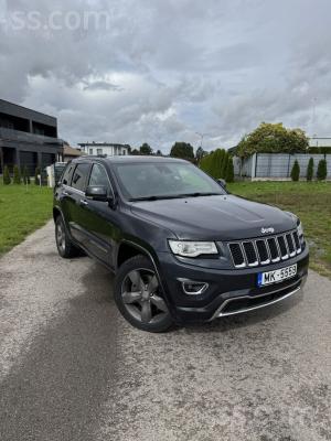 Zils Jeep Grand Cherokee 2014 Rīga, ar dzinēja tilpumu 3.00 L un nobraukumu 259 tūkst. km par 11800 €, foto  vietnē AUTOMOTO.COM.LV