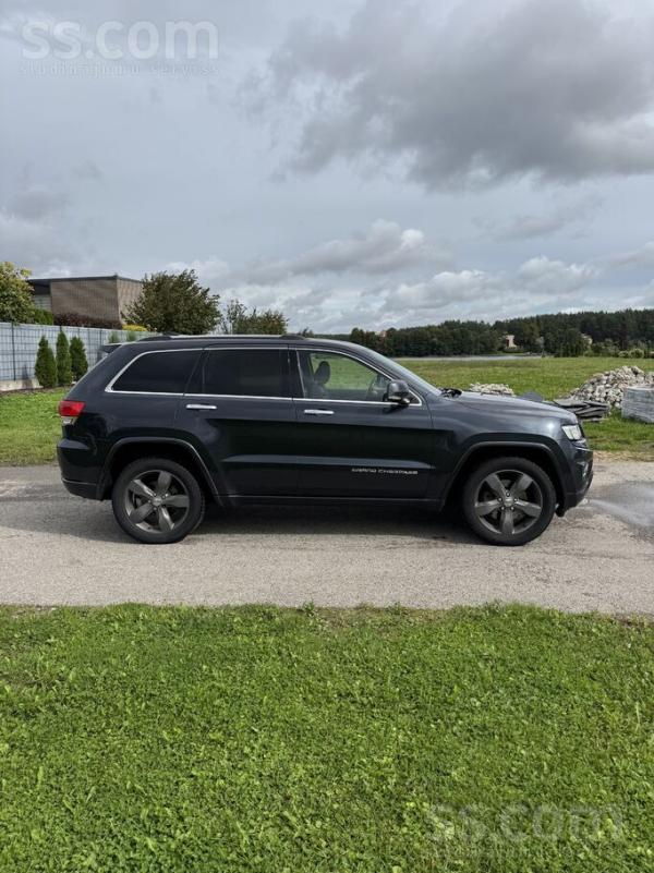 Blue Jeep Grand Cherokee 2014 in Riga, with an engine capacity of 3.00 L and mileage of 259 thousand km for 11800 €, photo 4 on AUTOMOTO.COM.LV