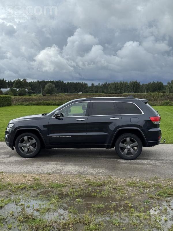 Blue Jeep Grand Cherokee 2014 in Riga, with an engine capacity of 3.00 L and mileage of 259 thousand km for 11800 €, photo 8 on AUTOMOTO.COM.LV