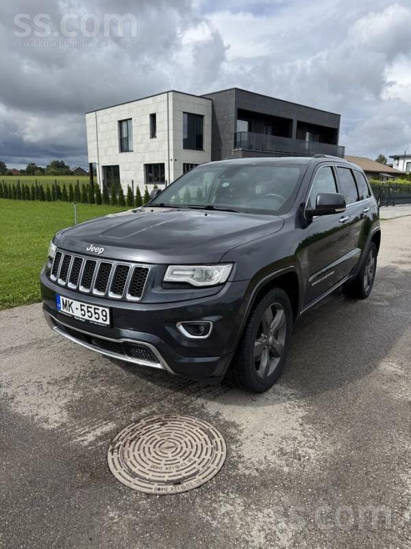 Blue Jeep Grand Cherokee 2014 in Riga, with an engine capacity of 3.00 L and mileage of 259 thousand km for 11800 €, photo 9 on AUTOMOTO.COM.LV