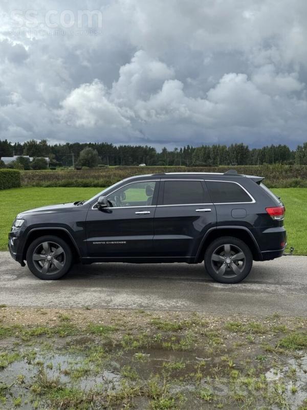 Zils Jeep Grand Cherokee 2014 Rīga, ar dzinēja tilpumu 3.00 L un nobraukumu 259 tūkst. km par 11800 €, foto 8 vietnē AUTOMOTO.COM.LV