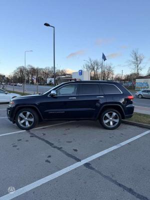 Zils Jeep Grand Cherokee 2015 Viļņa, ar dzinēja tilpumu 5.65 L un nobraukumu 255 tūkst. km par 13000 €, foto 2 vietnē AUTOMOTO.COM.LV