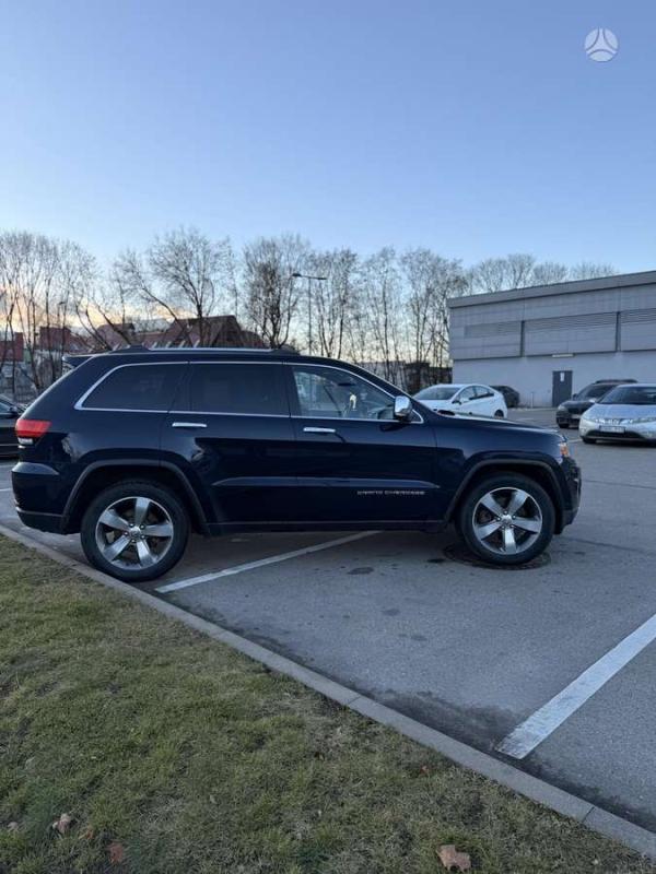 Zils Jeep Grand Cherokee 2015 Viļņa, ar dzinēja tilpumu 5.65 L un nobraukumu 255 tūkst. km par 13000 €, foto 4 vietnē AUTOMOTO.COM.LV