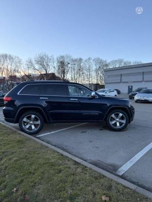Zils Jeep Grand Cherokee 2015 Viļņa, ar dzinēja tilpumu 5.65 L un nobraukumu 255 tūkst. km par 13000 €, foto 4 vietnē AUTOMOTO.COM.LV