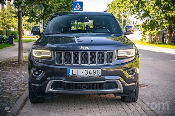 Blue Jeep Grand Cherokee 2015 in Riga, with an engine capacity of 3.00 L and mileage of 288 thousand km for 9990 €, photo 2 on AUTOMOTO.COM.LV