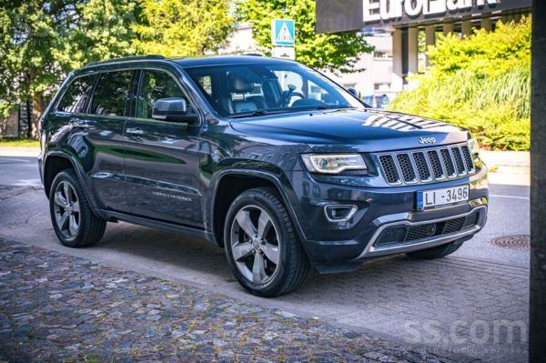 Blue Jeep Grand Cherokee 2015 in Riga, with an engine capacity of 3.00 L and mileage of 288 thousand km for 9990 €, photo 3 on AUTOMOTO.COM.LV