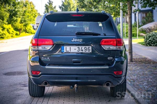 Blue Jeep Grand Cherokee 2015 in Riga, with an engine capacity of 3.00 L and mileage of 288 thousand km for 9990 €, photo 5 on AUTOMOTO.COM.LV