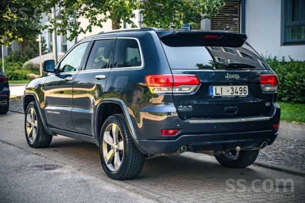 Blue Jeep Grand Cherokee 2015 in Riga, with an engine capacity of 3.00 L and mileage of 288 thousand km for 9990 €, photo 6 on AUTOMOTO.COM.LV