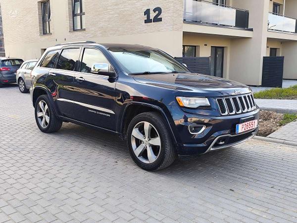 Zils Jeep Grand Cherokee 2015 Kauņa, ar dzinēja tilpumu 3.60 L un nobraukumu 244 tūkst. km par 10500 €, foto 1 vietnē AUTOMOTO.COM.LV