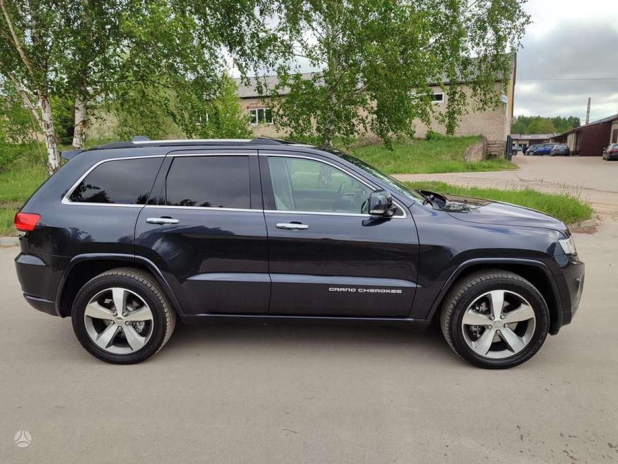 Blue Jeep Grand Cherokee 2015 in Taurage, with an engine capacity of 2.99 L and mileage of 197 thousand km for 10900 €, photo 11 on AUTOMOTO.COM.LV