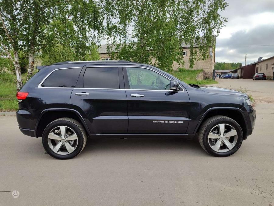 Blue Jeep Grand Cherokee 2015 in Taurage, with an engine capacity of 2.99 L and mileage of 197 thousand km for 10900 €, photo 12 on AUTOMOTO.COM.LV
