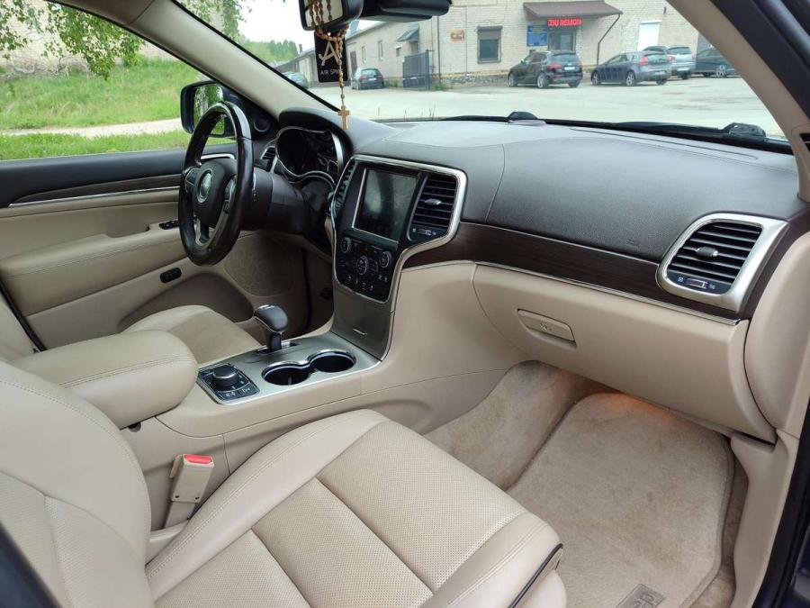 Blue Jeep Grand Cherokee 2015 in Taurage, with an engine capacity of 2.99 L and mileage of 197 thousand km for 10900 €, photo 25 on AUTOMOTO.COM.LV