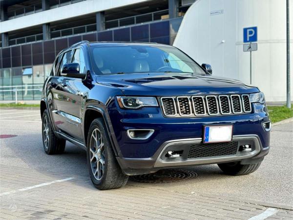 Jeep Grand Cherokee 2018 Viļņa vietnē Zils Jeep Grand Cherokee 2018 Viļņa, ar dzinēja tilpumu 3.60 L un nobraukumu 160 tūkst. km par 18500 €, foto 3 vietnē AUTOMOTO.COM.LV