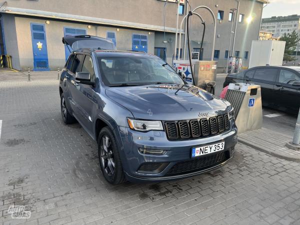 Blue Jeep Grand Cherokee 2020 in Vilnius, with an engine capacity of 3.60 L and mileage of 127 thousand km for 25999 €, photo 1 on AUTOMOTO.COM.LV