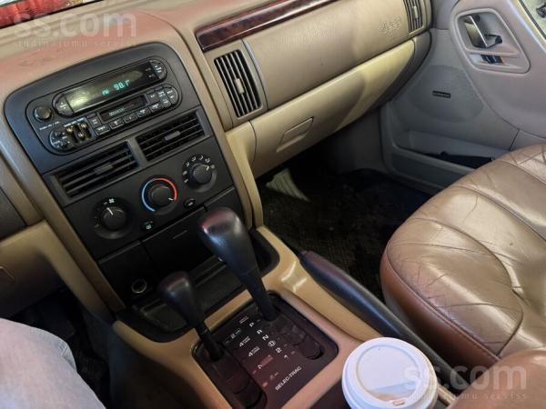 Brūns Jeep Grand Cherokee 2000 Valmiera, ar dzinēja tilpumu 4.00 L un nobraukumu 146 tūkst. km par 3100 €, foto 7 vietnē AUTOMOTO.COM.LV