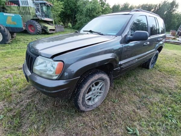 Brown Jeep Grand Cherokee 2000 in Valka, with an engine capacity of 4.70 L and mileage of 389 thousand km for 1800 €, photo 1 on AUTOMOTO.COM.LV