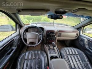 Brown Jeep Grand Cherokee 2000 in Valka, with an engine capacity of 4.70 L and mileage of 389 thousand km for 1800 €, photo 7 on AUTOMOTO.COM.LV