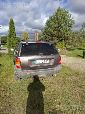 Brūns Jeep Grand Cherokee 2000 Jelgava, ar dzinēja tilpumu 4.00 L un nobraukumu 237 tūkst. km par 4000 €, foto 4 vietnē AUTOMOTO.COM.LV