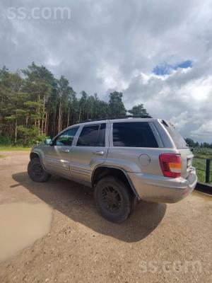 Brown Jeep Grand Cherokee 2002 in Liepaja, with an engine capacity of 2.70 L and mileage of 343 thousand km for 2430 €, photo 5 on AUTOMOTO.COM.LV