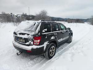 Brown Jeep Grand Cherokee 2007 in Vilnius, with an engine capacity of 5.70 L and mileage of 290 thousand km for 3900 €, photo  on AUTOMOTO.COM.LV