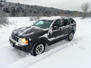 Brown Jeep Grand Cherokee 2007 in Vilnius, with an engine capacity of 5.70 L and mileage of 290 thousand km for 3500 €, photo 5 on AUTOMOTO.COM.LV