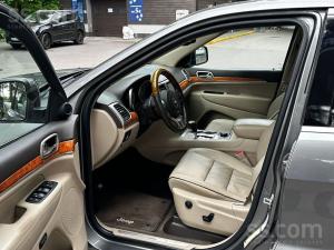 Brūns Jeep Grand Cherokee 2012 Rīga, ar dzinēja tilpumu 3.00 L un nobraukumu 264 tūkst. km par 8390 €, foto 28 vietnē AUTOMOTO.COM.LV