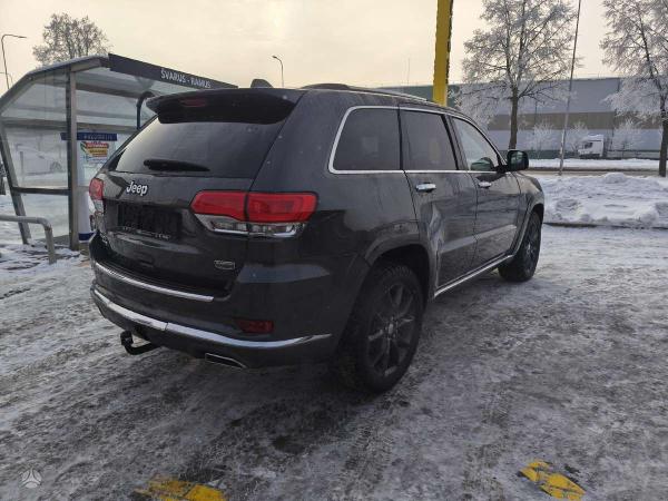 Brown Jeep Grand Cherokee 2015 in Kelme, with an engine capacity of 2.99 L and mileage of 261 thousand km for 12800 €, photo 5 on AUTOMOTO.COM.LV